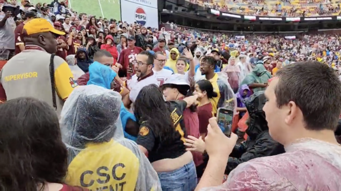 Female Commanders Fan Sucker Punches Another Woman During Brawl In ...
